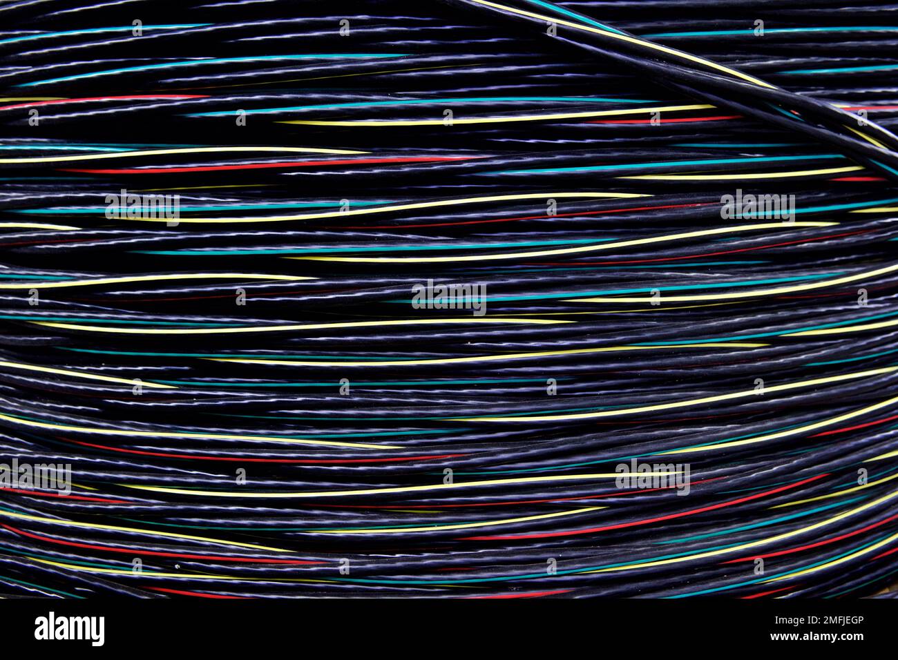 a reel of multi-colored cable for power lines Stock Photo - Alamy