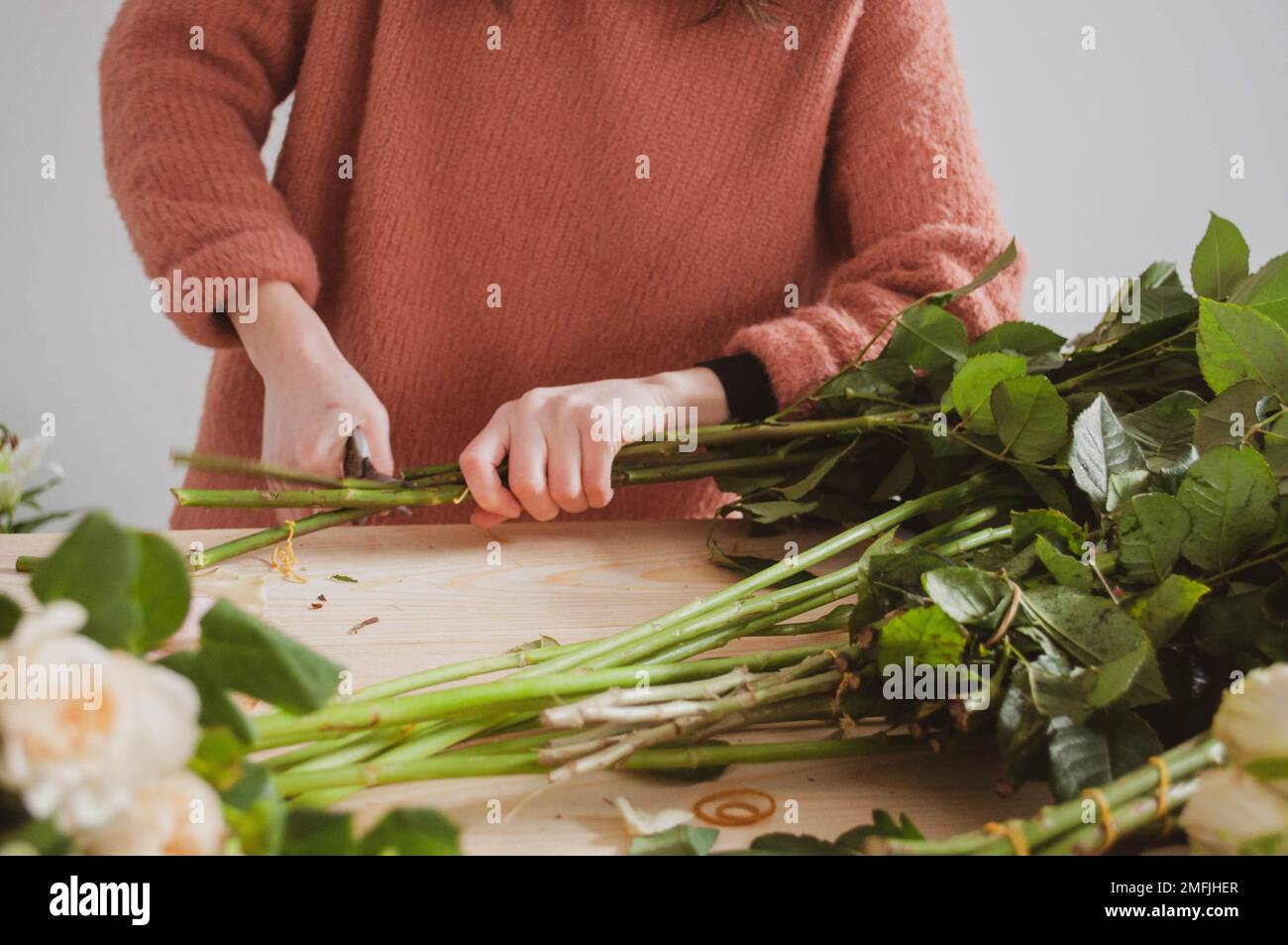 Cutting stems on bunch of flowers hi-res stock photography and images ...