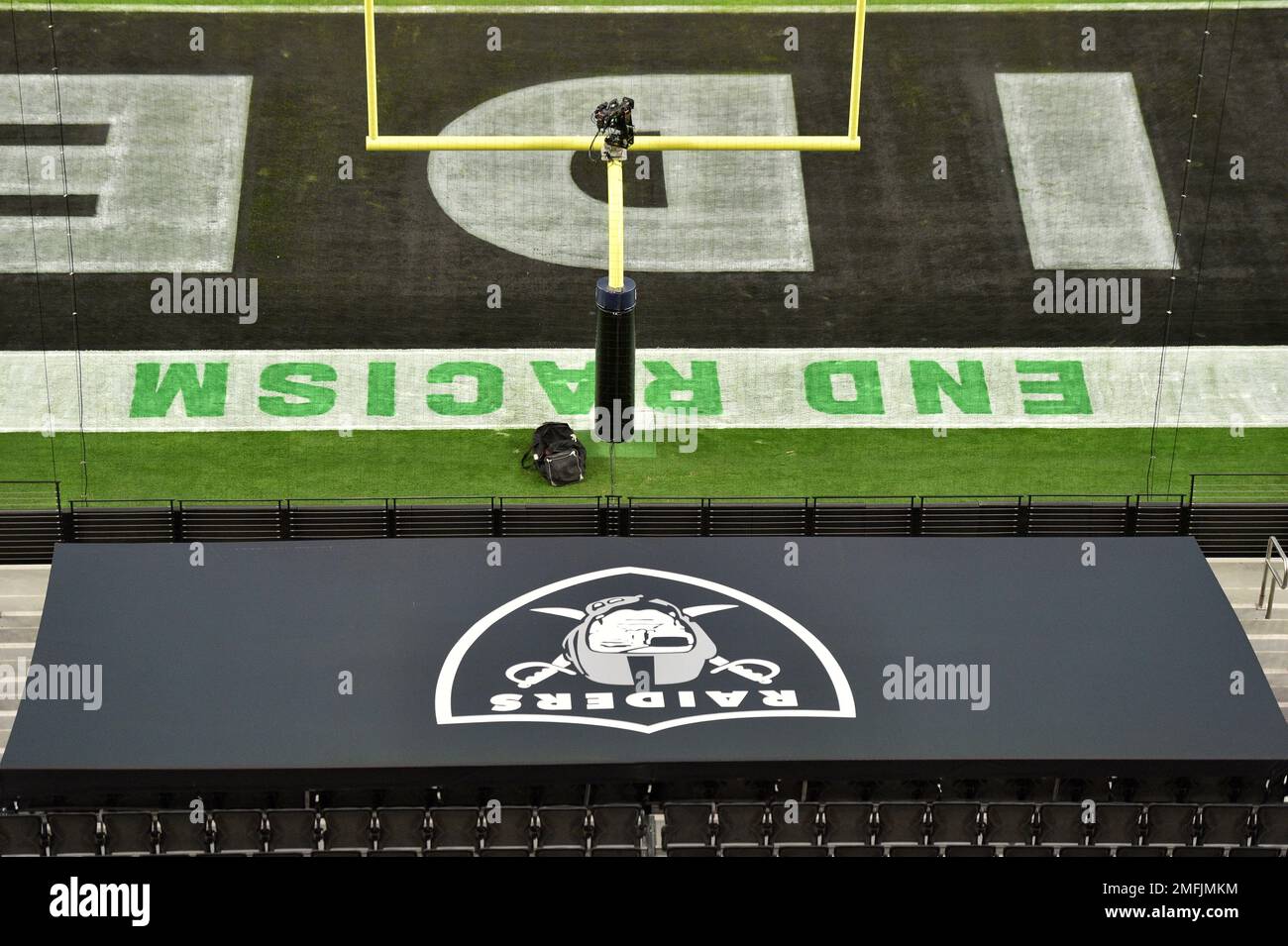 End Racism is written in the end zone before an NFL football game ...