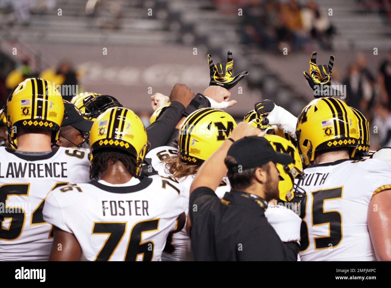 Missouri offensive lineman Javon Foster (76) and Bobby Lawrence (64 ...