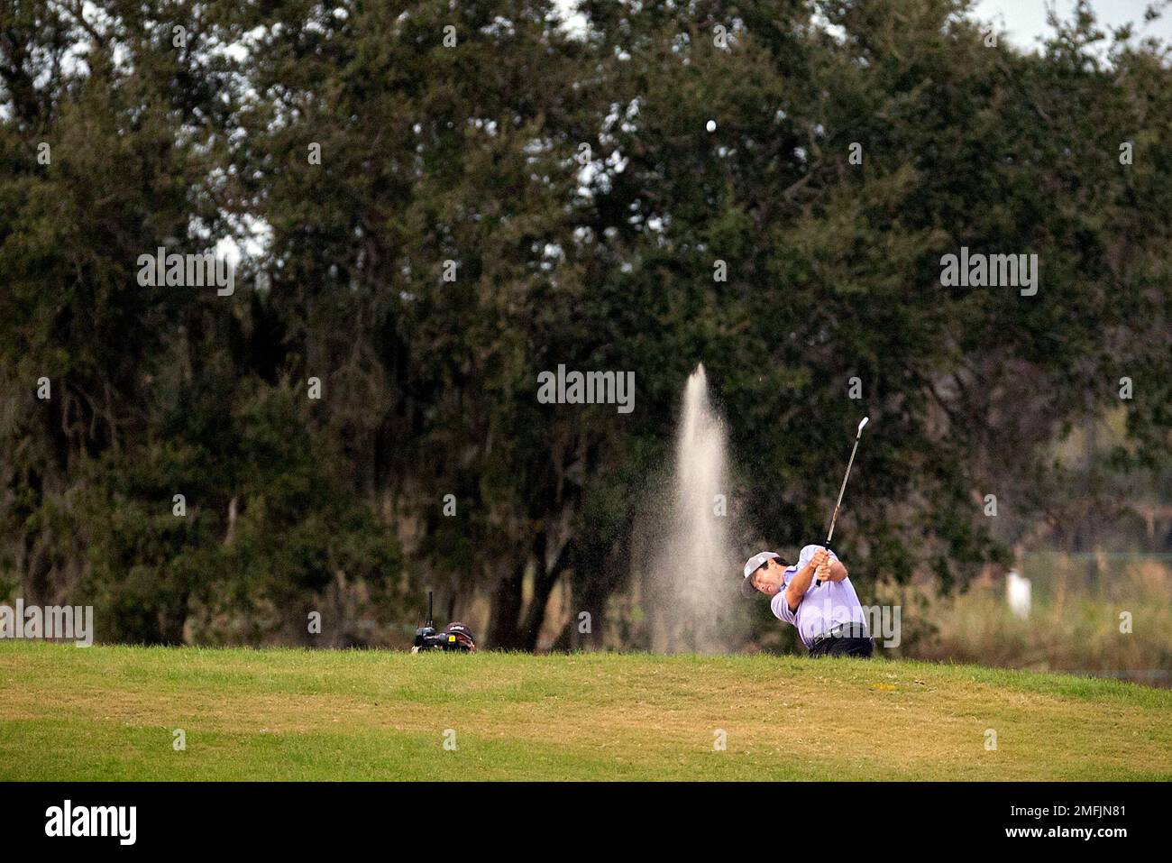 Robert Streb hits out of the fairway bunker during the first playoff ...