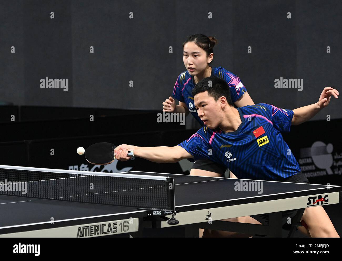 Doha, Qatar. 25th Jan, 2023. Qian Tianyi (back)/Xiang Peng of China ...