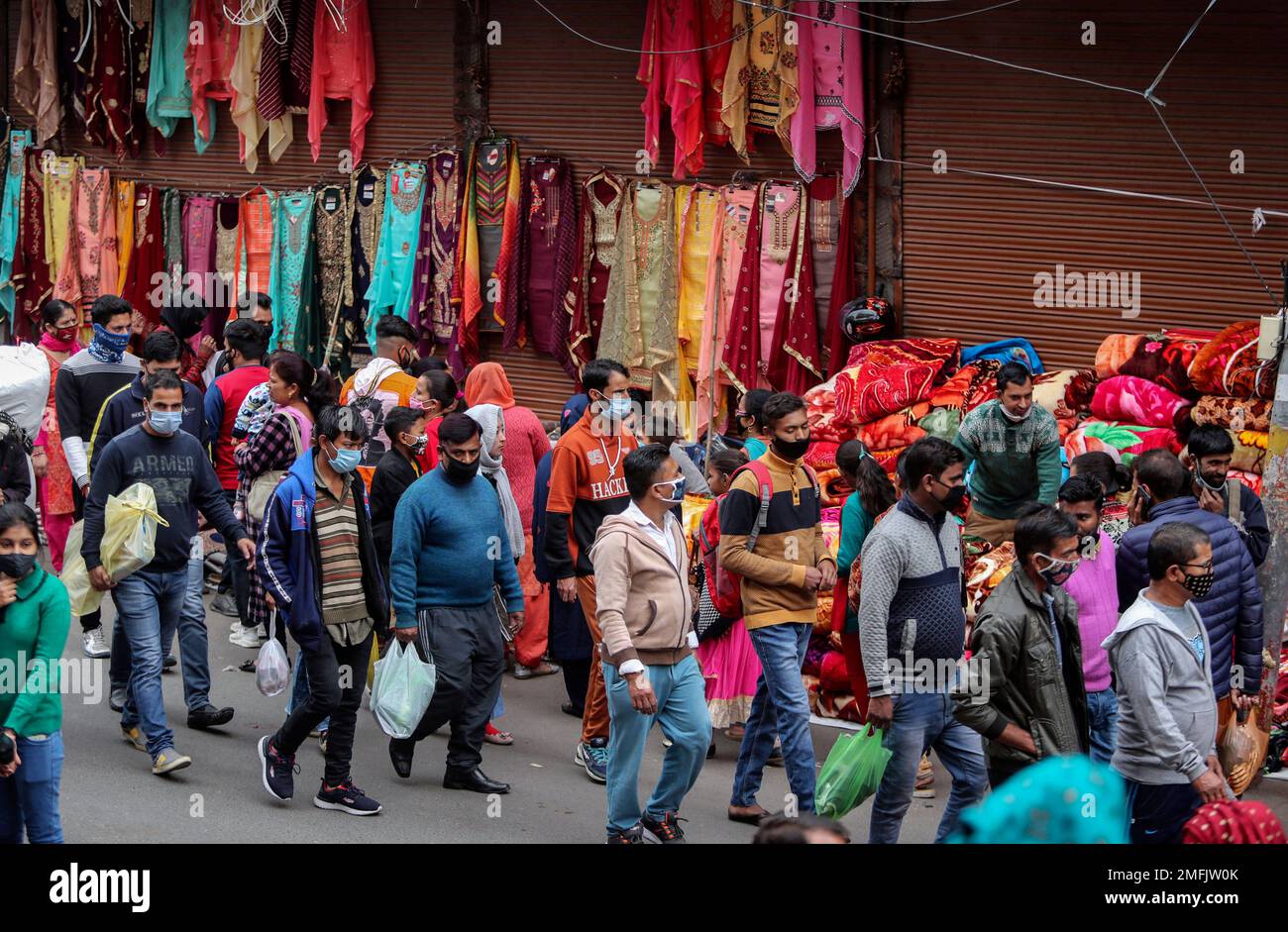 Indians, most of them, wearing face masks as a precautionary measure ...