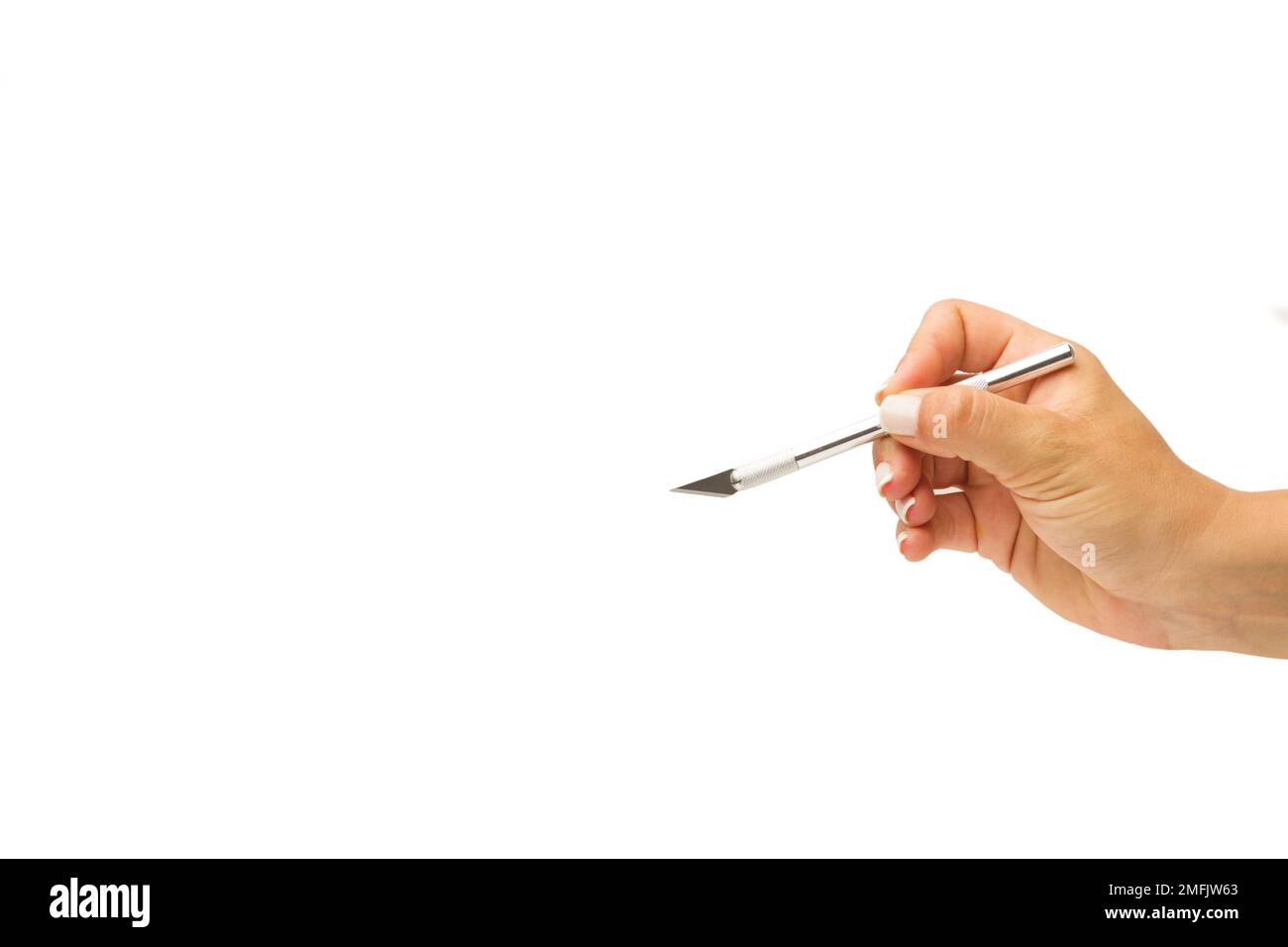 Hand holding utility blade hi-res stock photography and images - Alamy