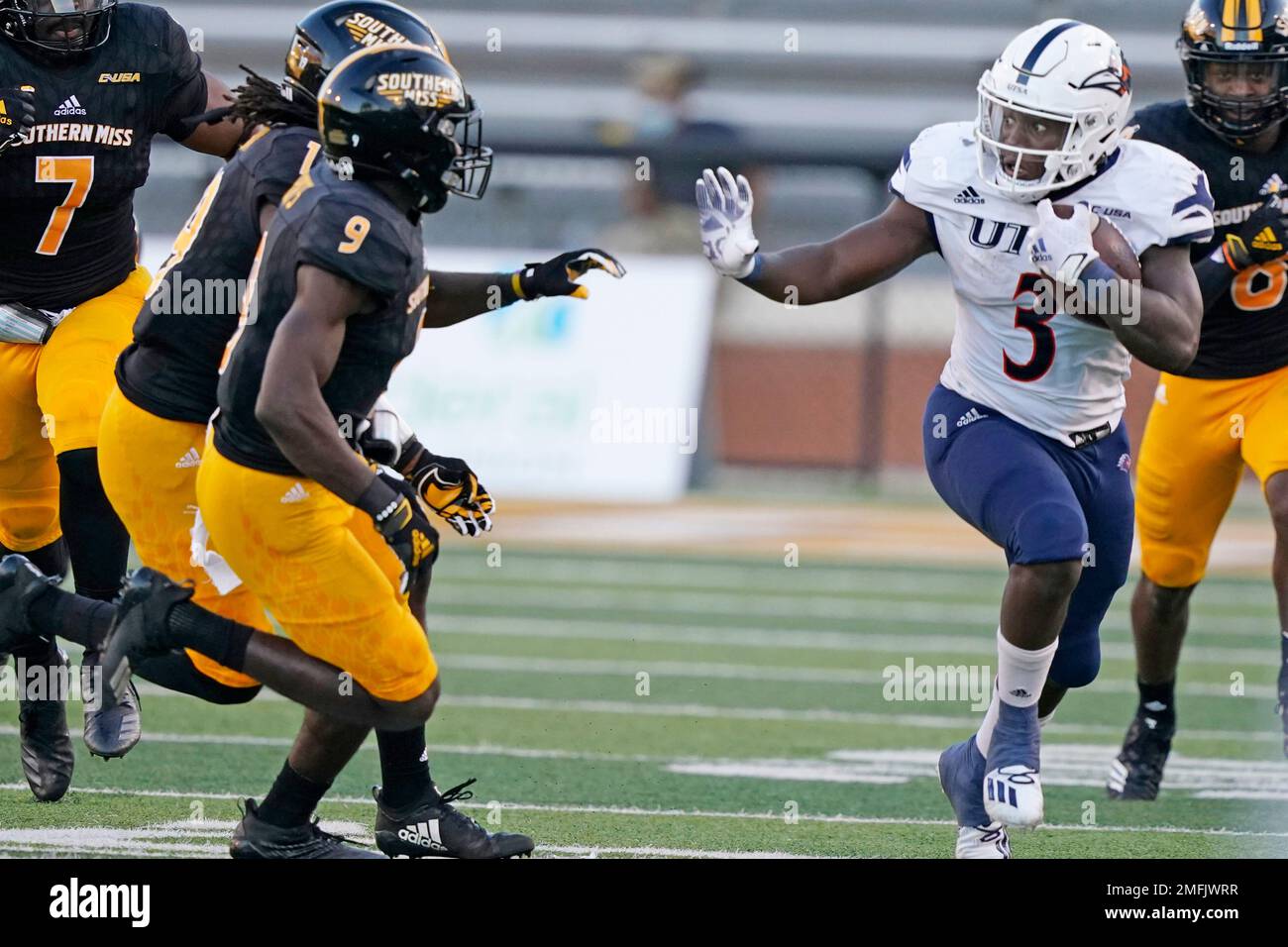 UTSA running back Sincere McCormick (3) fights off an attempted tackle ...