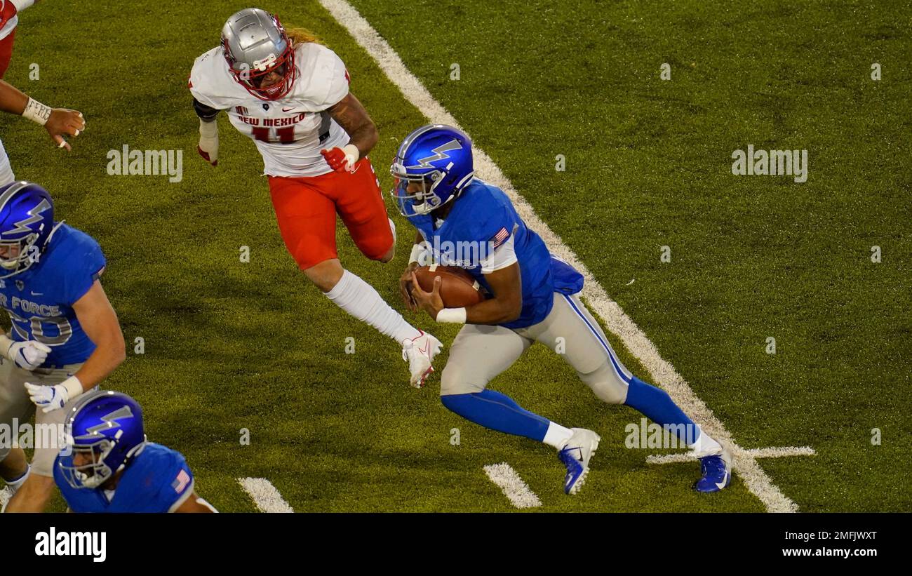 New Mexico linebacker Kameron Miller (11) pursues Air Force quarterback ...