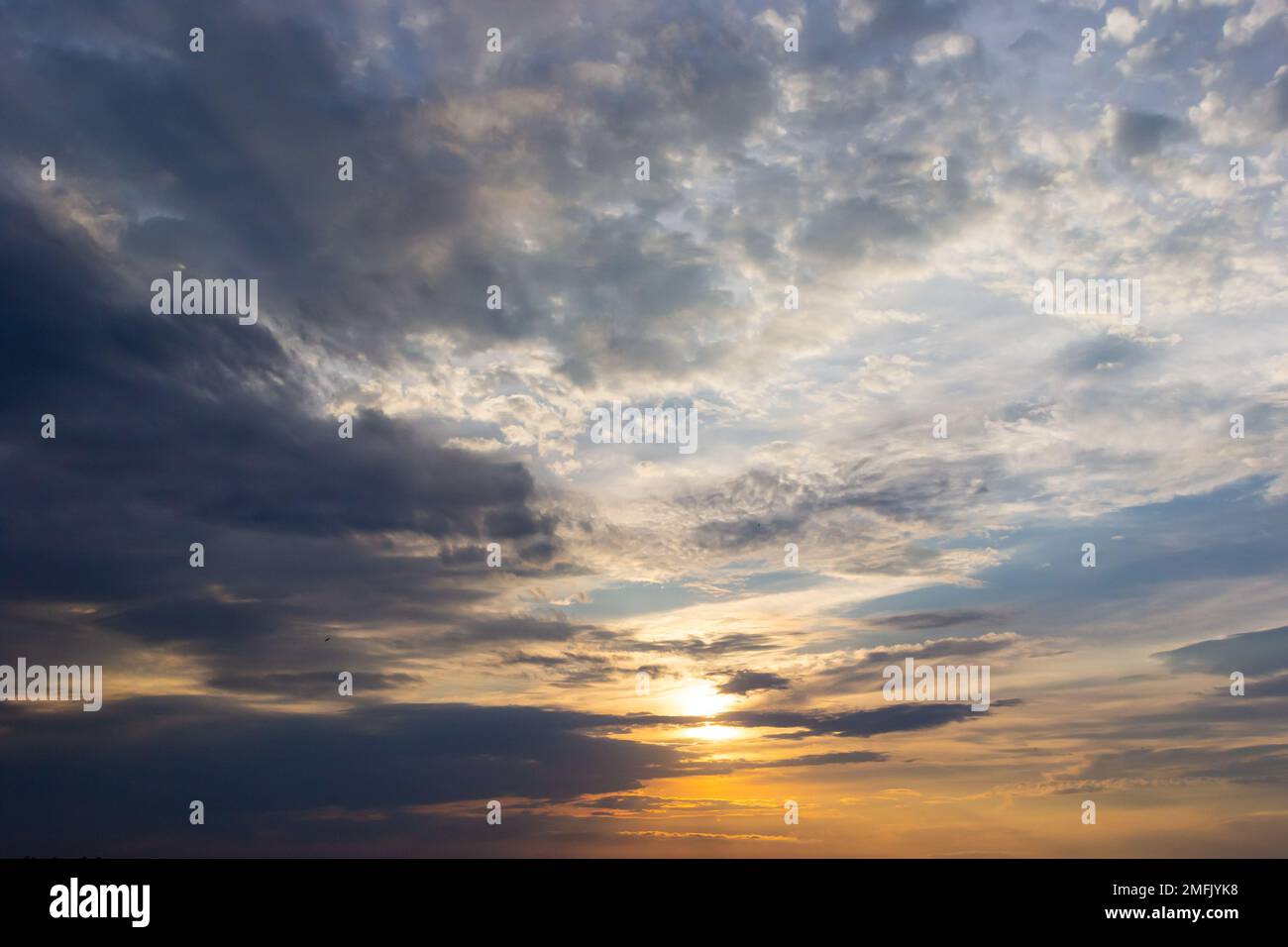 sunset sky with multicolor clouds. Dramatic twilight sky background ...