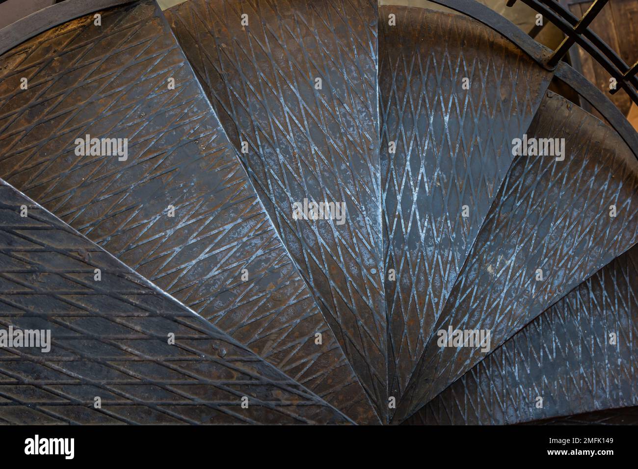 Pattern on metal black stair around the metal pole Stock Photo - Alamy