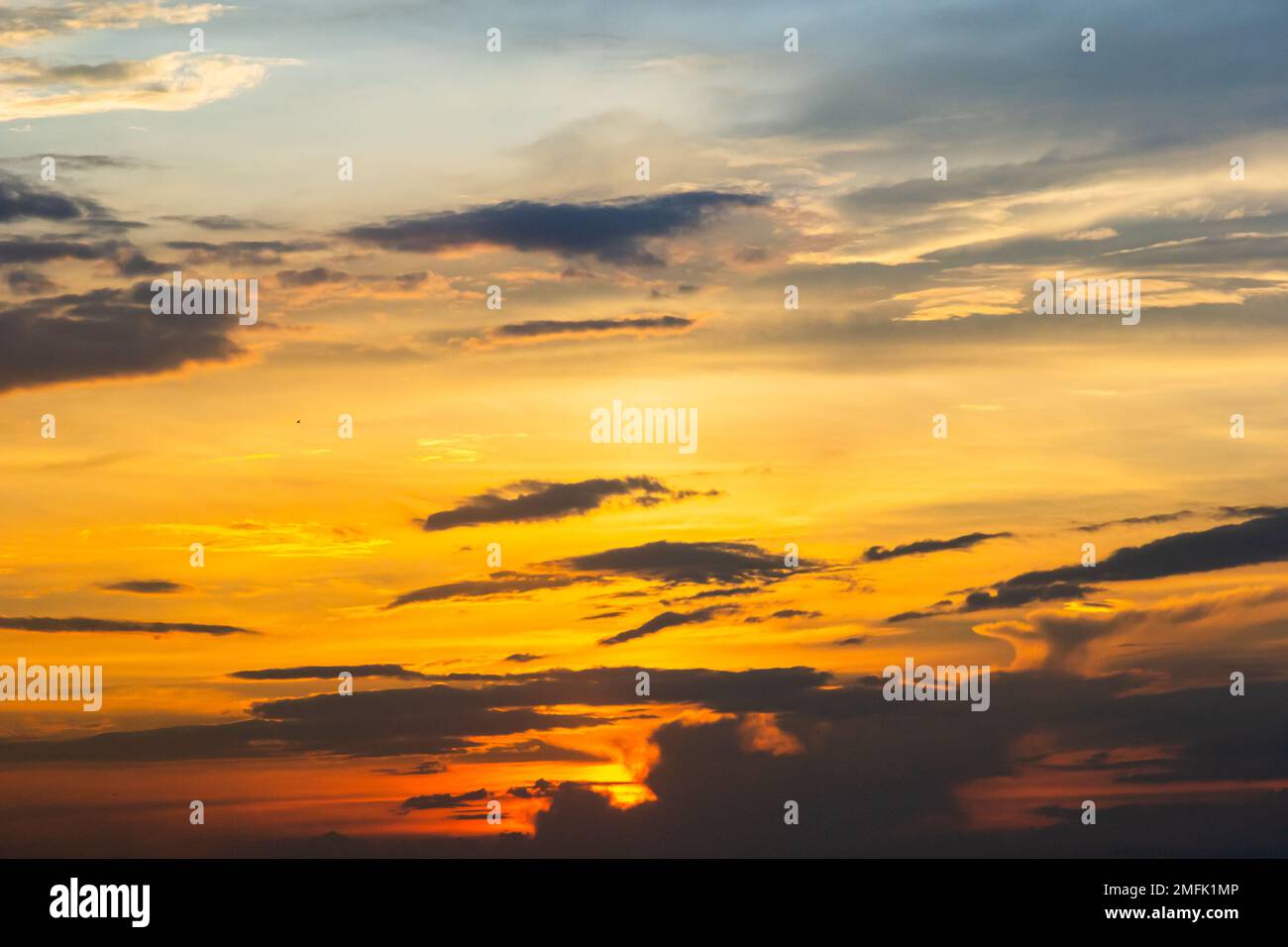 sunset sky with multicolor clouds. Dramatic twilight sky background ...