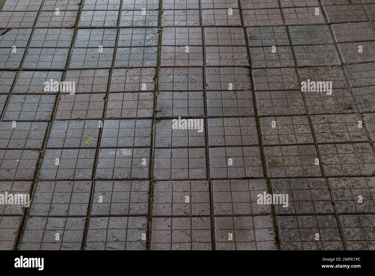 Granite dirty paving stones in the city. Road from paving stones for ...