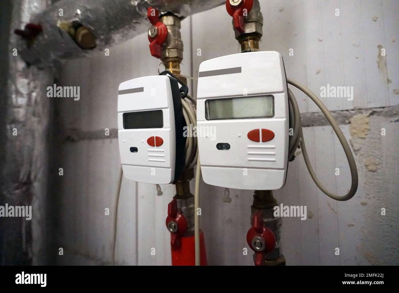Two central heating meters installed on water pipes Stock Photo - Alamy