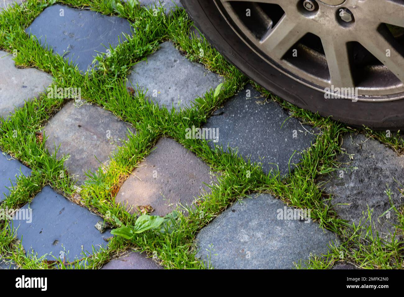 Cobblestone brick car park parking hi-res stock photography and images - Alamy