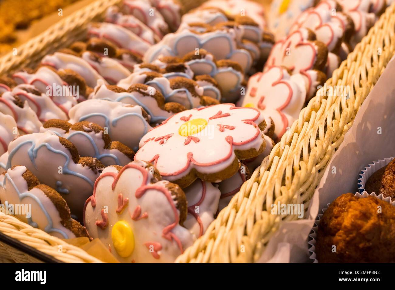 glazed flower shaped pastries on a bakery counter Stock Photo - Alamy