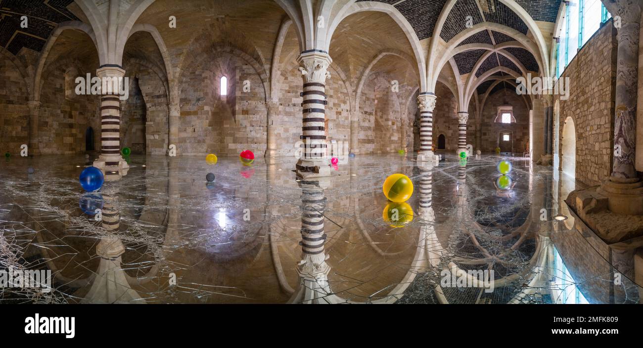 Panoramic view of an art installation with mirrors and glass spheres in ...