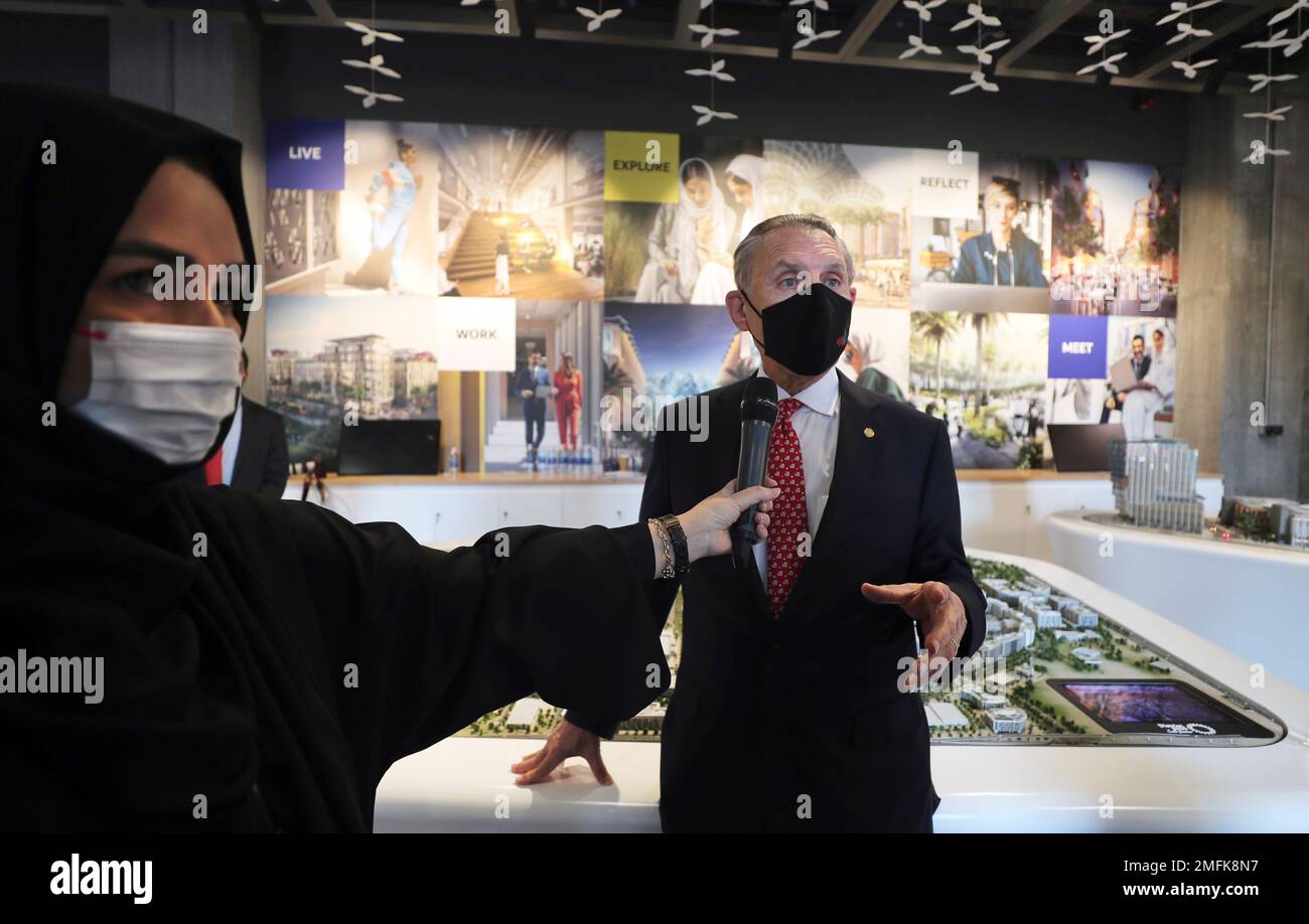 U.S. Ambassador John Rakolta talks with a UAE TV presenter during the U ...