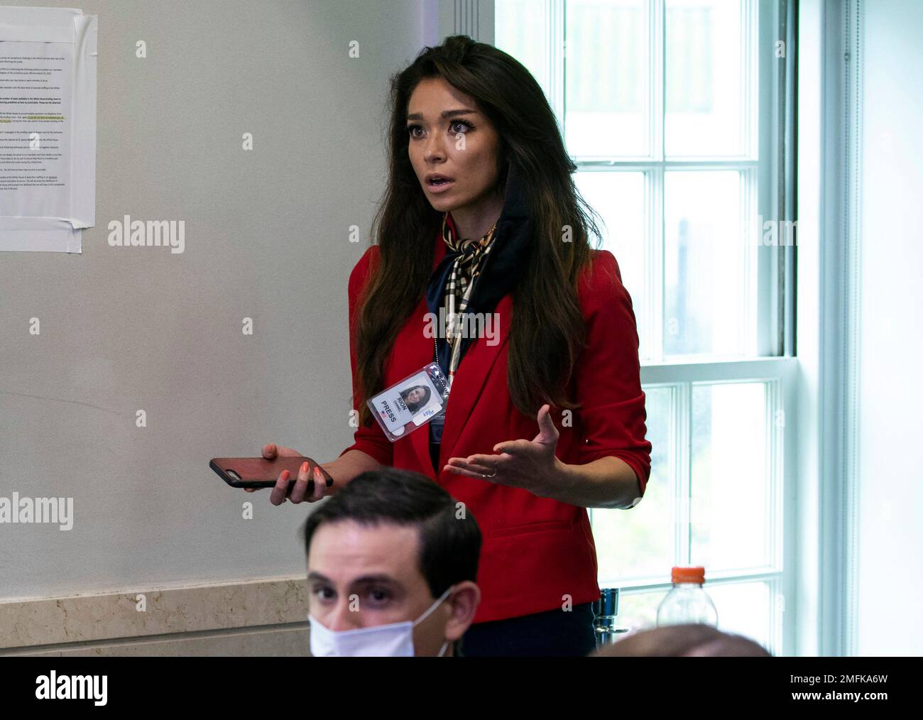 FILE - One America News Network reporter Chanel Rion asks a question of ...