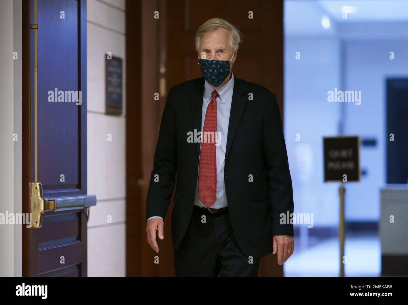 Sen. Angus King, I-Maine, walks through a corridor at the Capitol after ...
