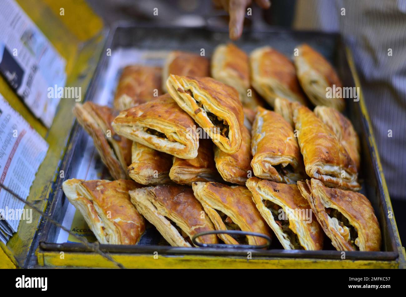 The tasty pies made with puff pastry in the street market Stock Photo ...