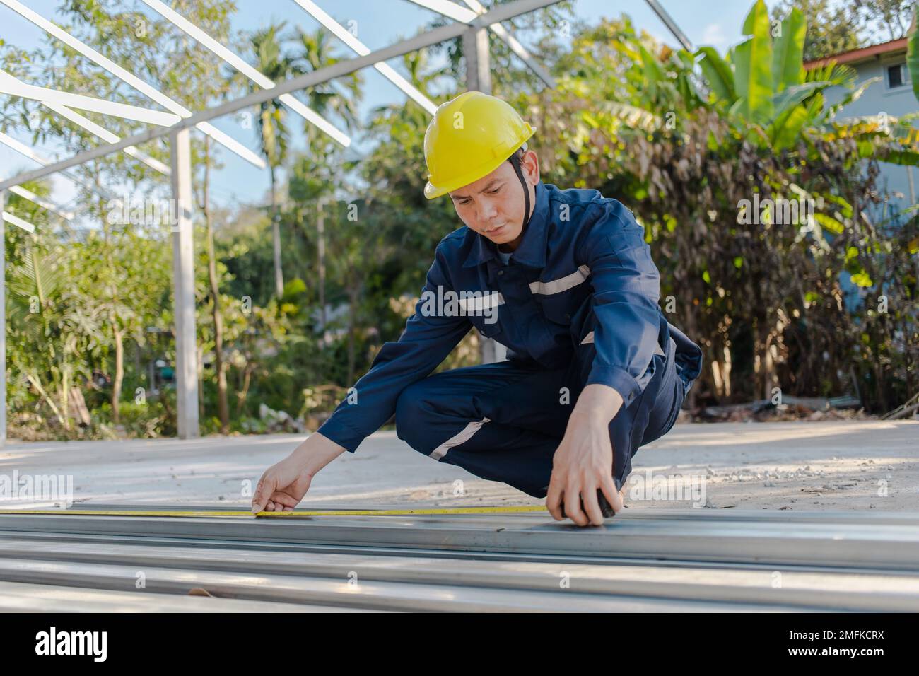 Engineer checking work at construction building Stock Photo - Alamy