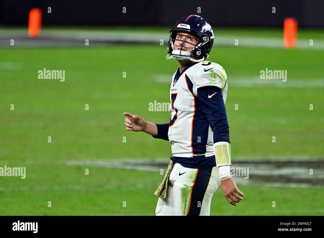 Denver Broncos quarterback Drew Lock (3) looks on after a play against ...