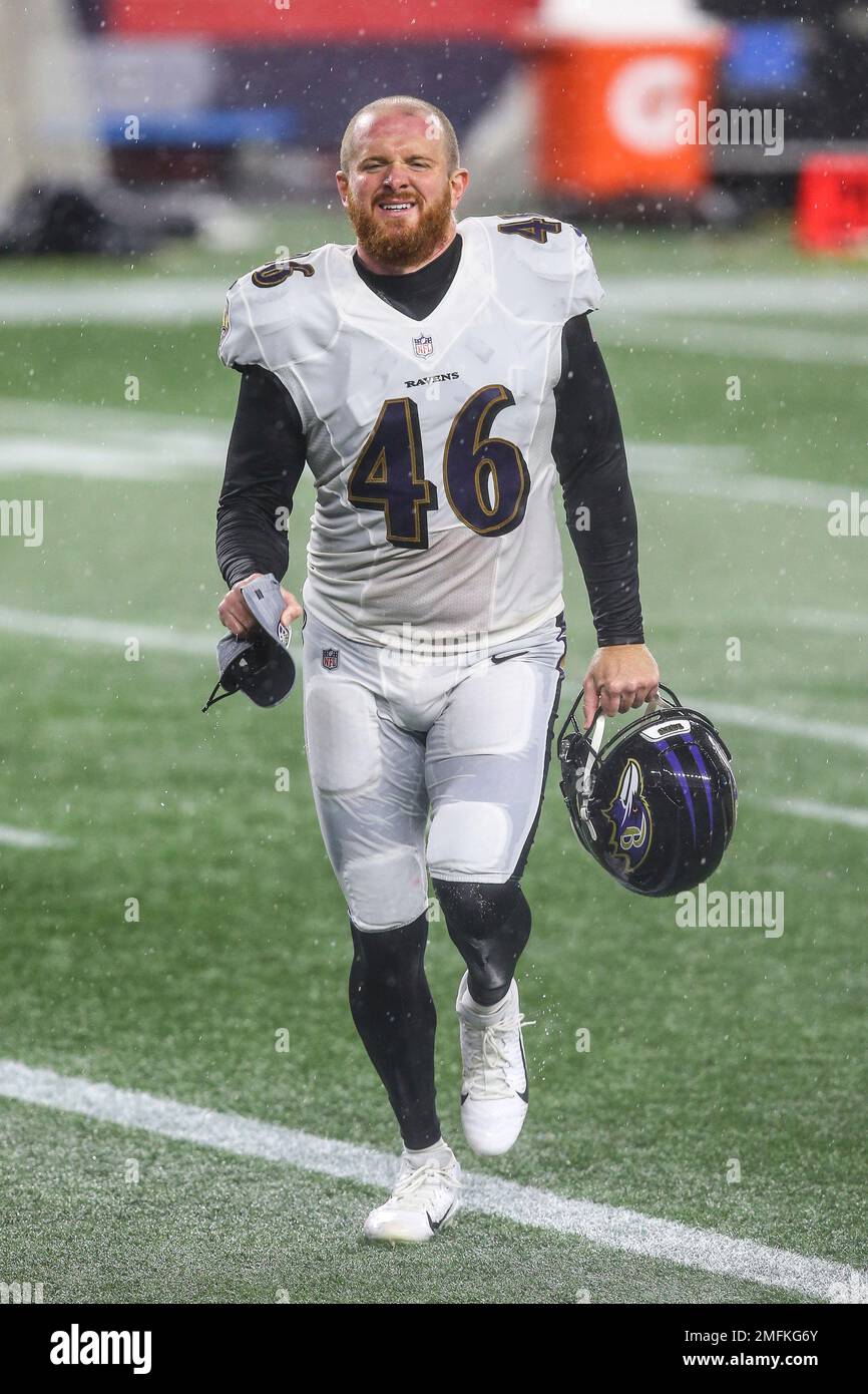 Baltimore Ravens long snapper Morgan Cox (46) runs off the field ...
