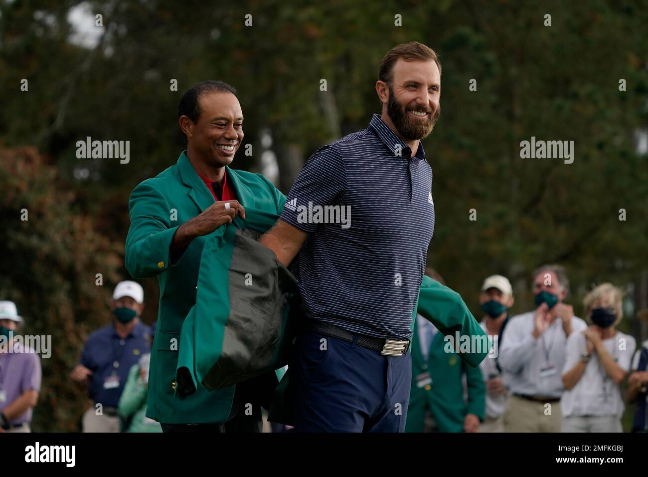Tiger Woods, left and Dustin Johnson during the final round of the ...