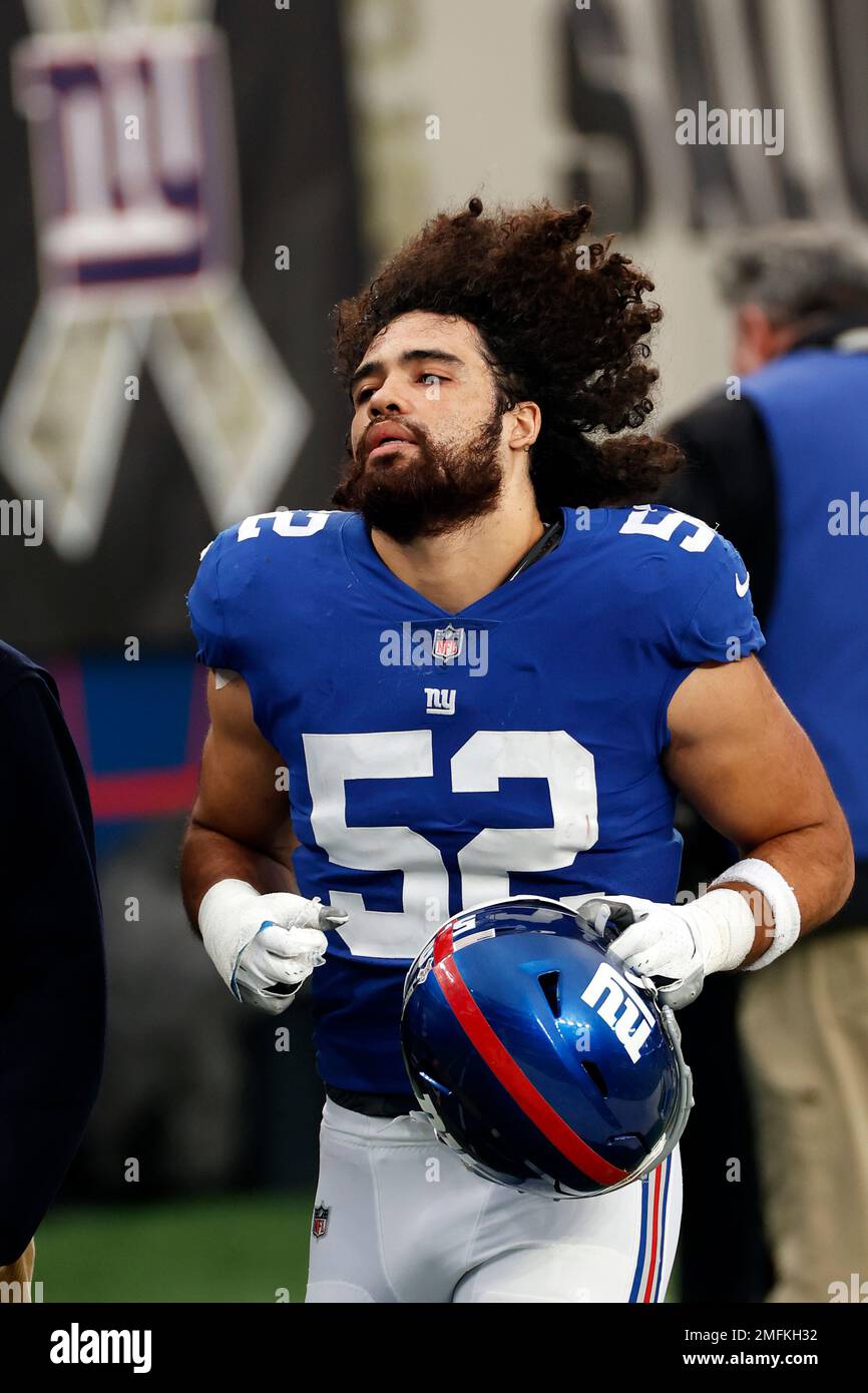 New York Giants linebacker Devante Downs (52) heads off the field ...