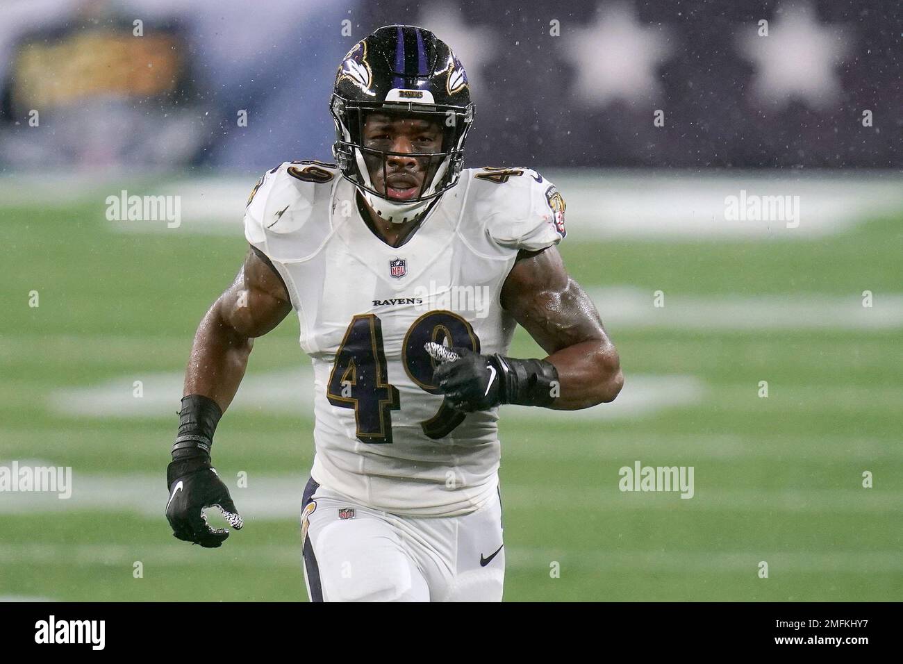 Baltimore Ravens linebacker Chris Board runs down the field in the ...