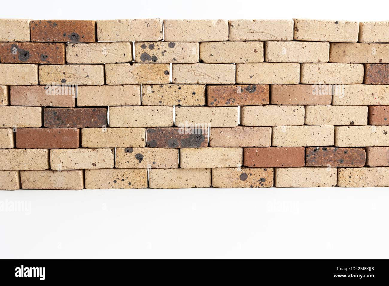 A pattern of brown, white bricks isolated on white background Stock ...