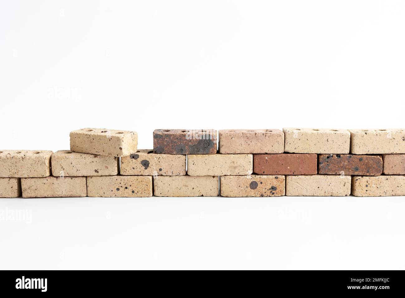 A pattern of brown, white bricks isolated on white background Stock ...