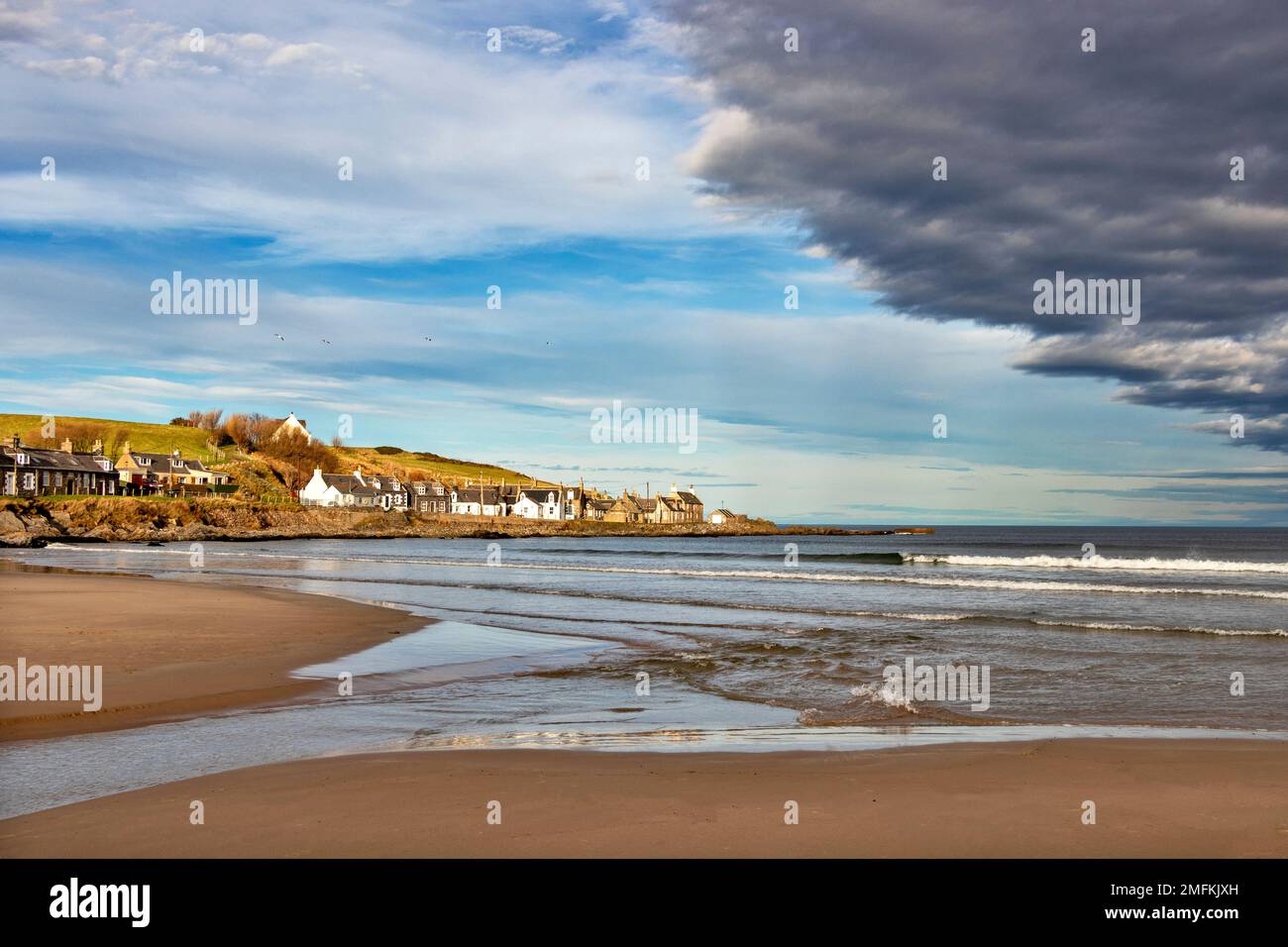 Sandend Aberdeenshire Scotland a row of houses above the bay sandy ...