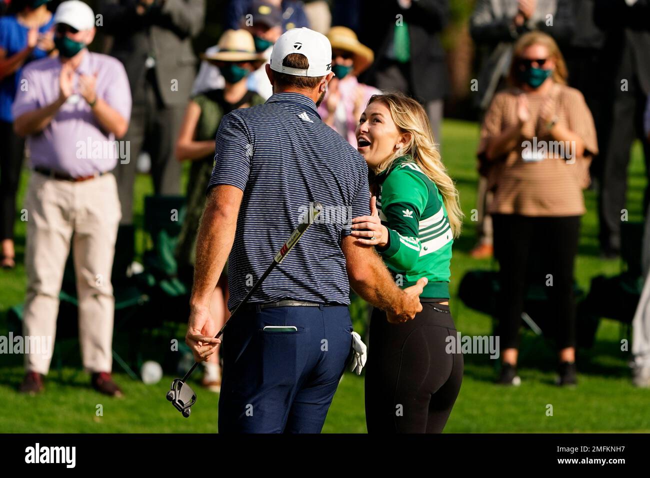 Dustin Johnson walks with Paulina Gretzky after winning the Masters ...