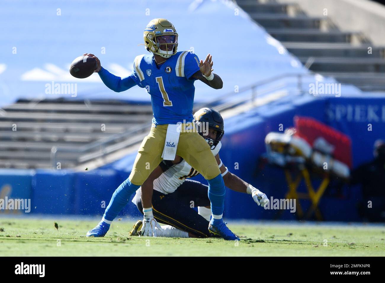 UCLA quarterback Dorian Thompson-Robinson, front, throws a pass in ...