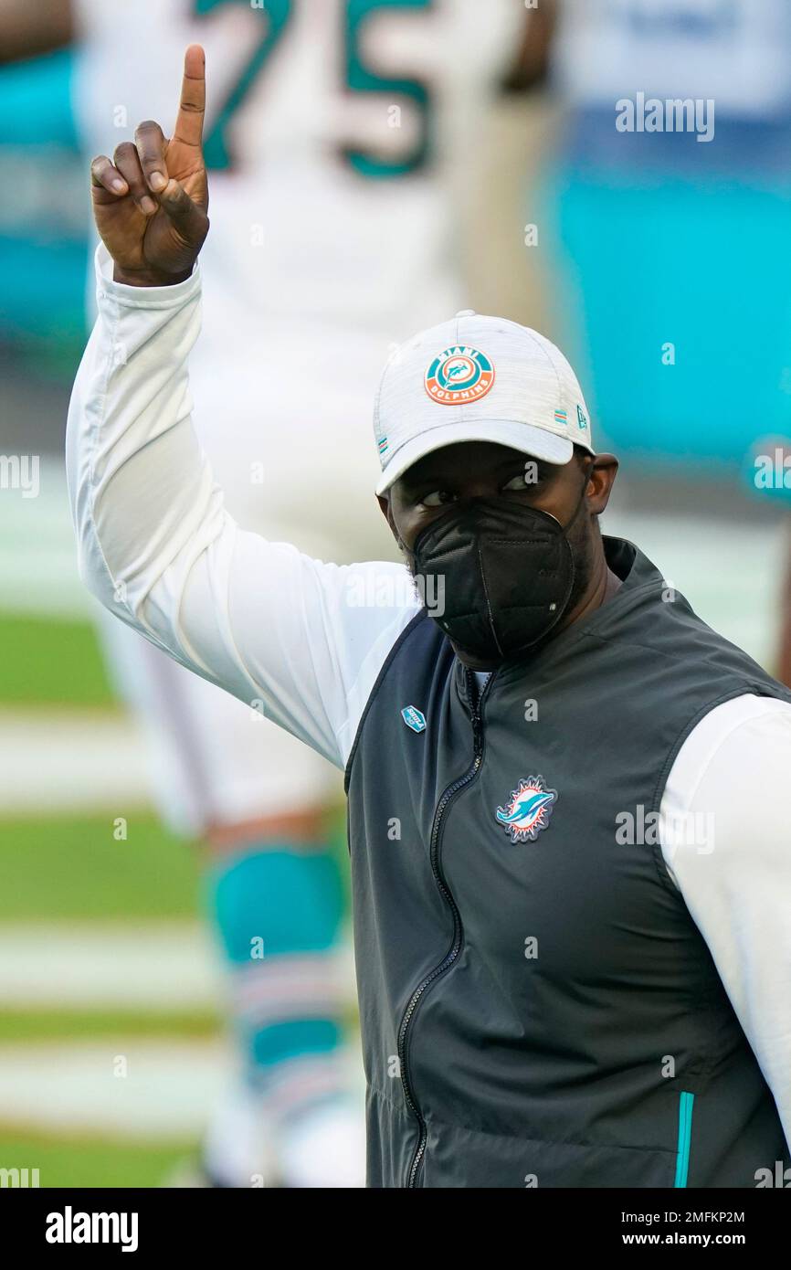 Miami Dolphins head coach Brian Flores gestures before an NFL football ...