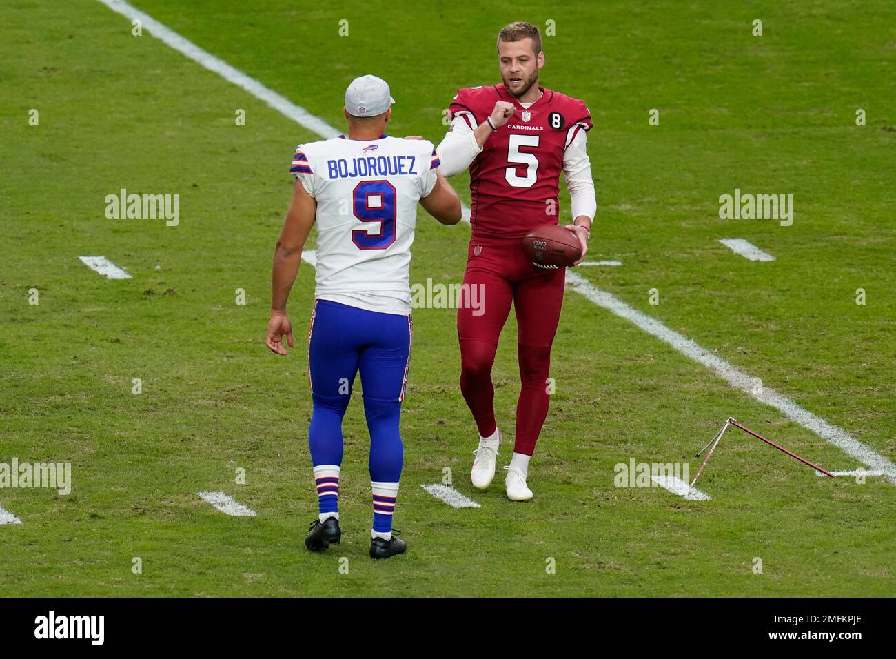 Buffalo Bills punter Corey Bojorquez (9) and Arizona Cardinals kicker ...