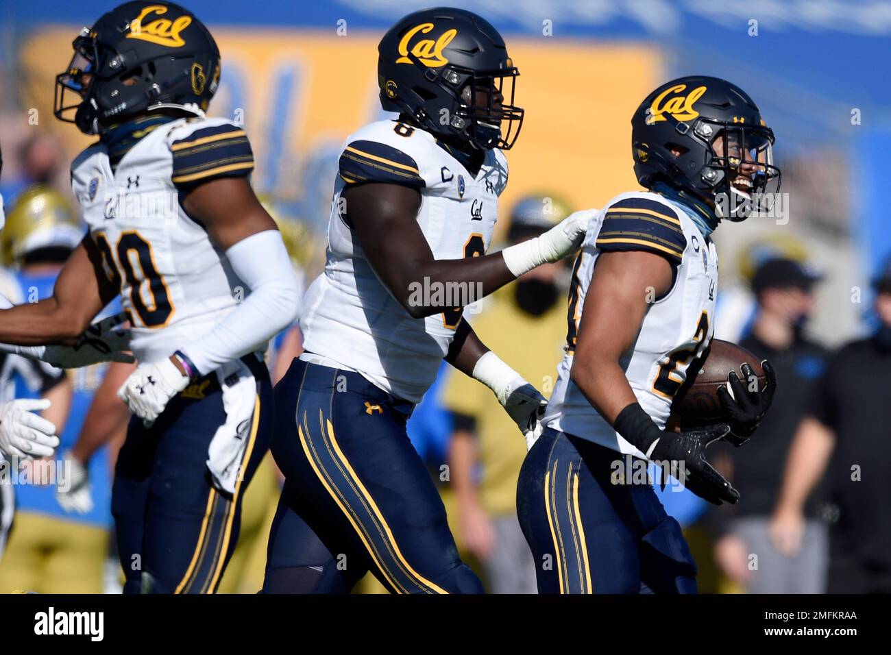 California cornerback Camryn Bynum, right, celebrates after ...