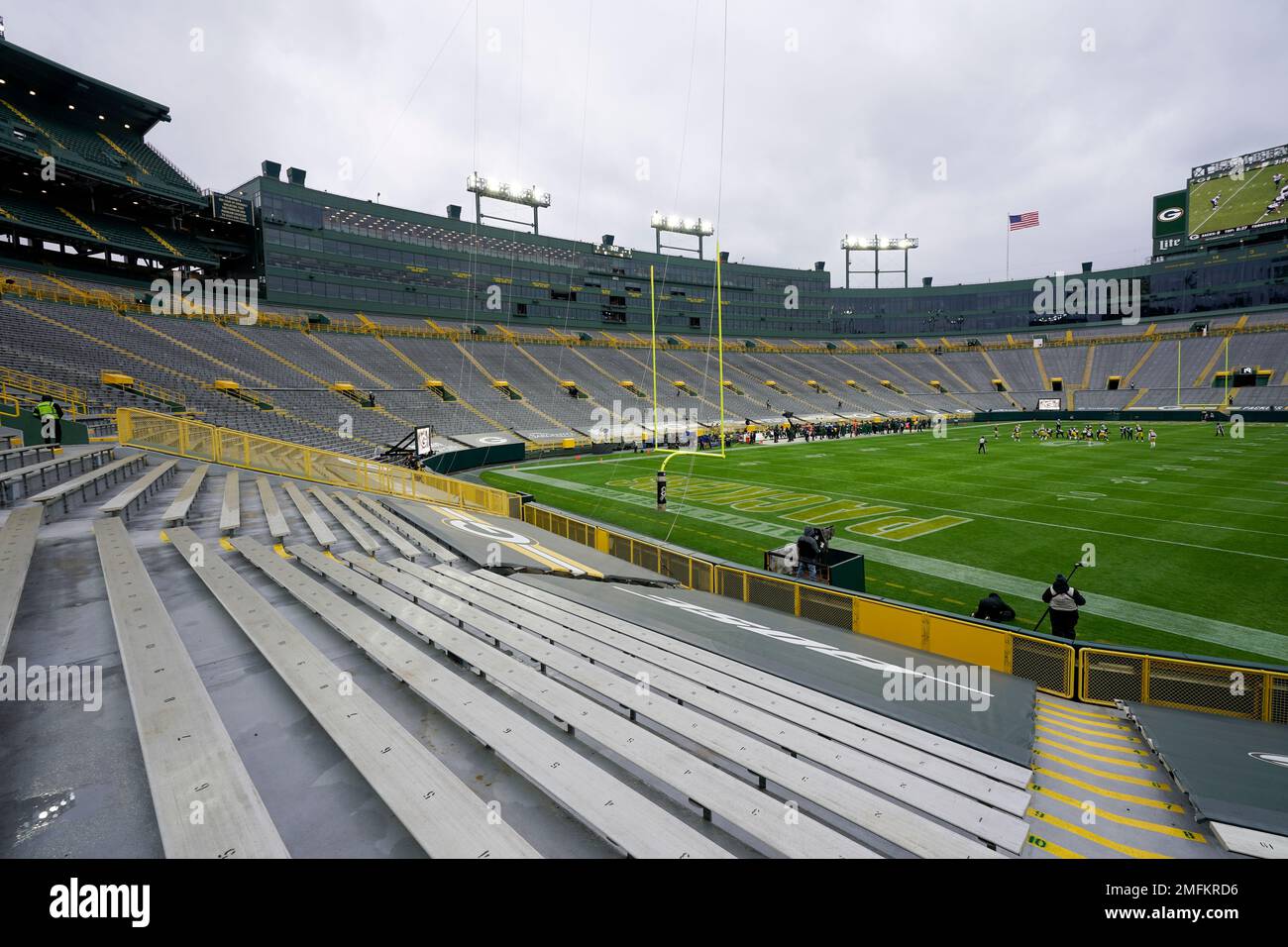 The seats at Lambeau Field are empty during the first half of an NFL ...