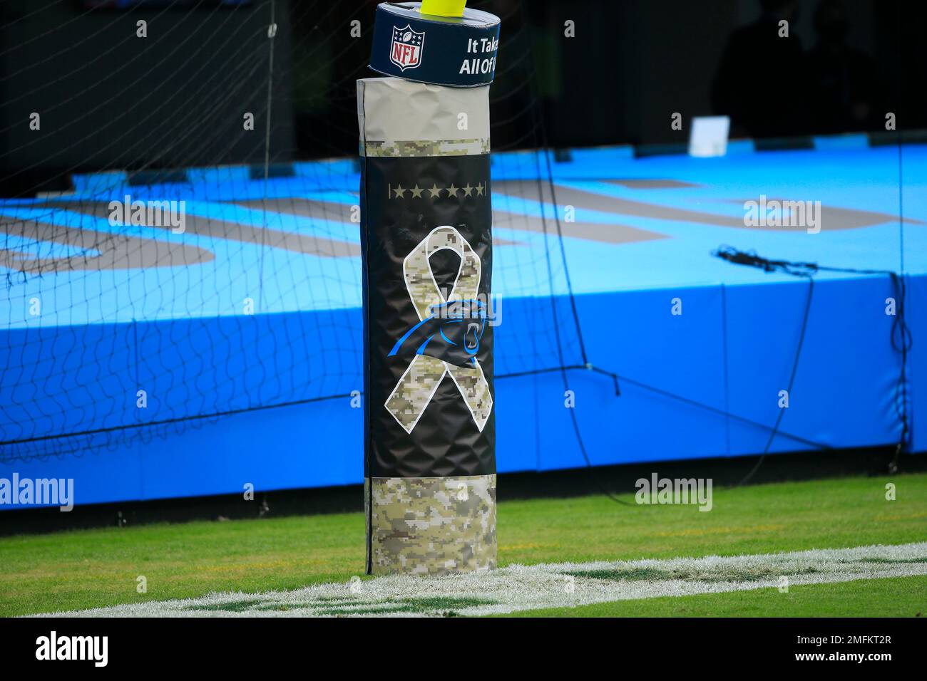 A goal post is wrapped in Salute to Service signage before the first ...