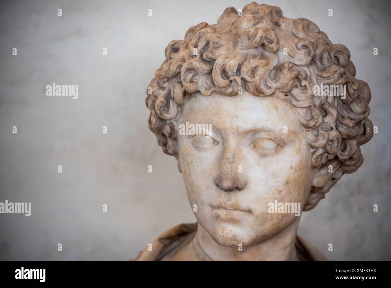 Close-up on face of little boy sculpted in marble Stock Photo - Alamy