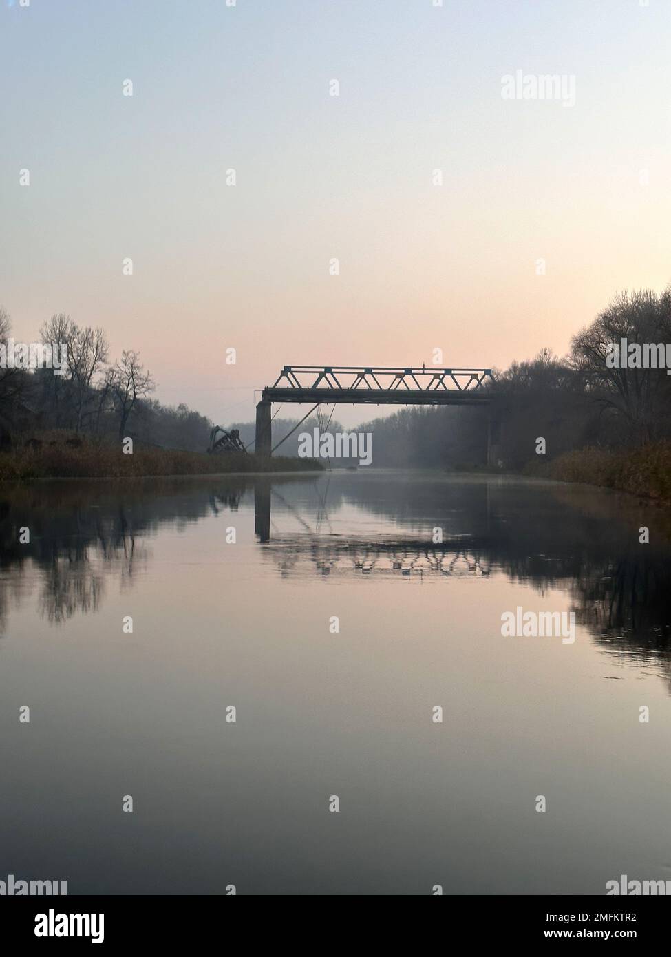 Destroyed railroad bridge across the river as a result of Russian ...