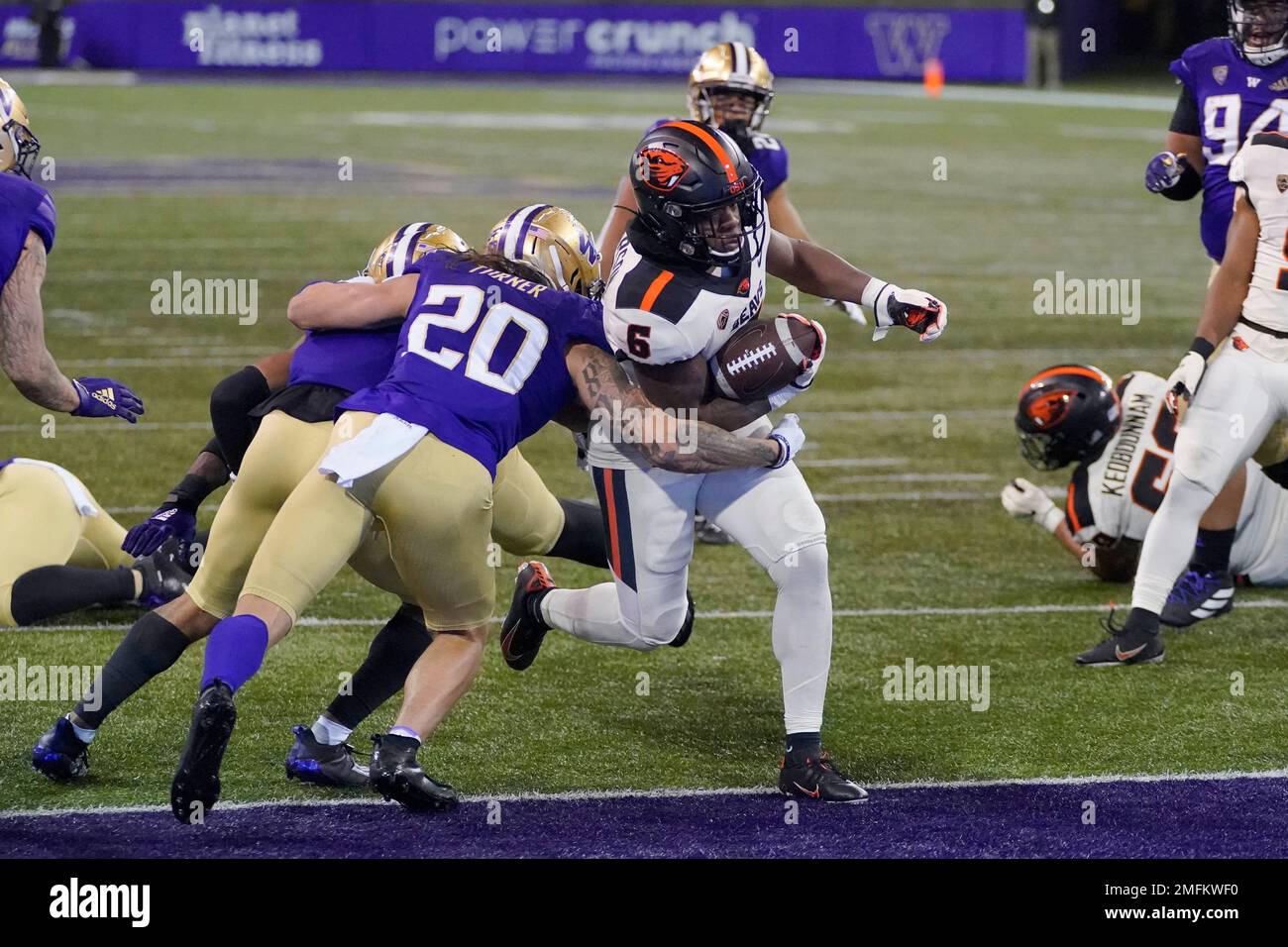 Oregon State running back Jermar Jefferson (6) scores a touchdown past ...