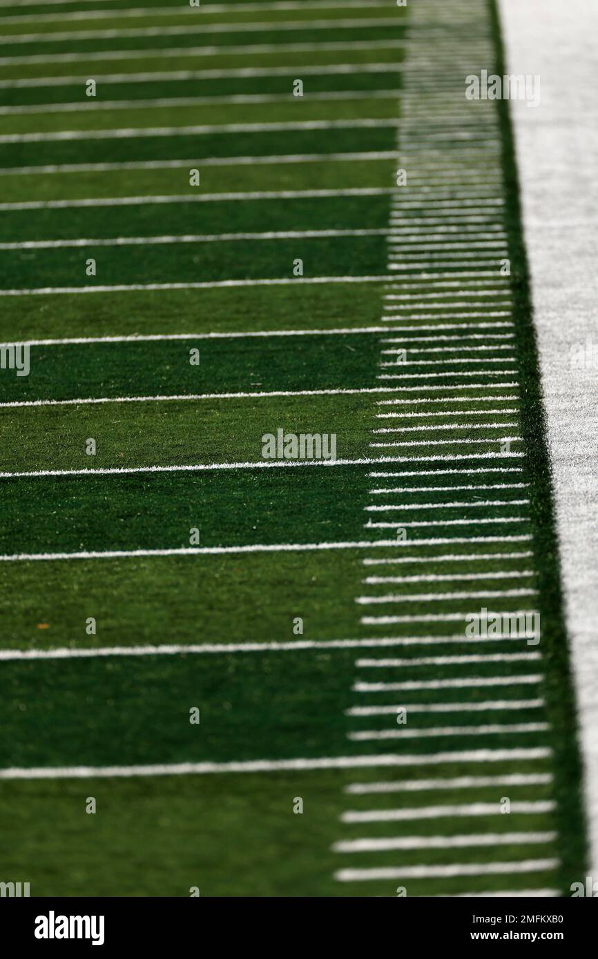 Yard markings on a football field are seen during the first half of an ...