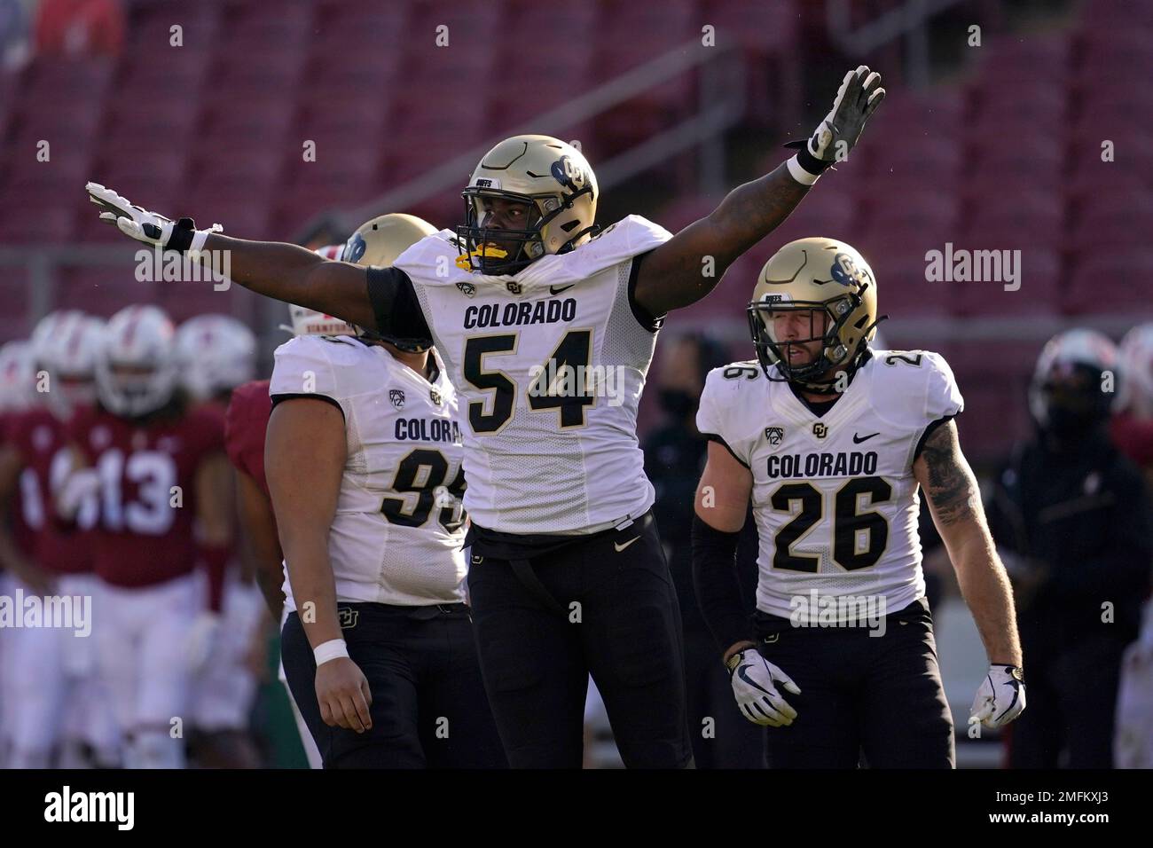 Colorado defensive end Terrance Lang (54) celebrates after making a ...