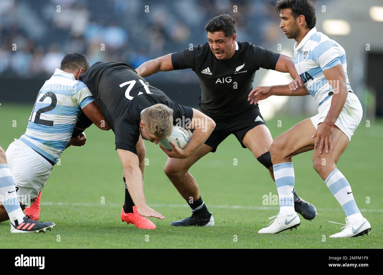 Argentina's Santiago Chocobares, left, tackles New Zealand's Jack ...