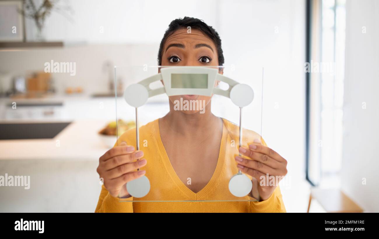 Funny scales hi-res stock photography and images - Alamy