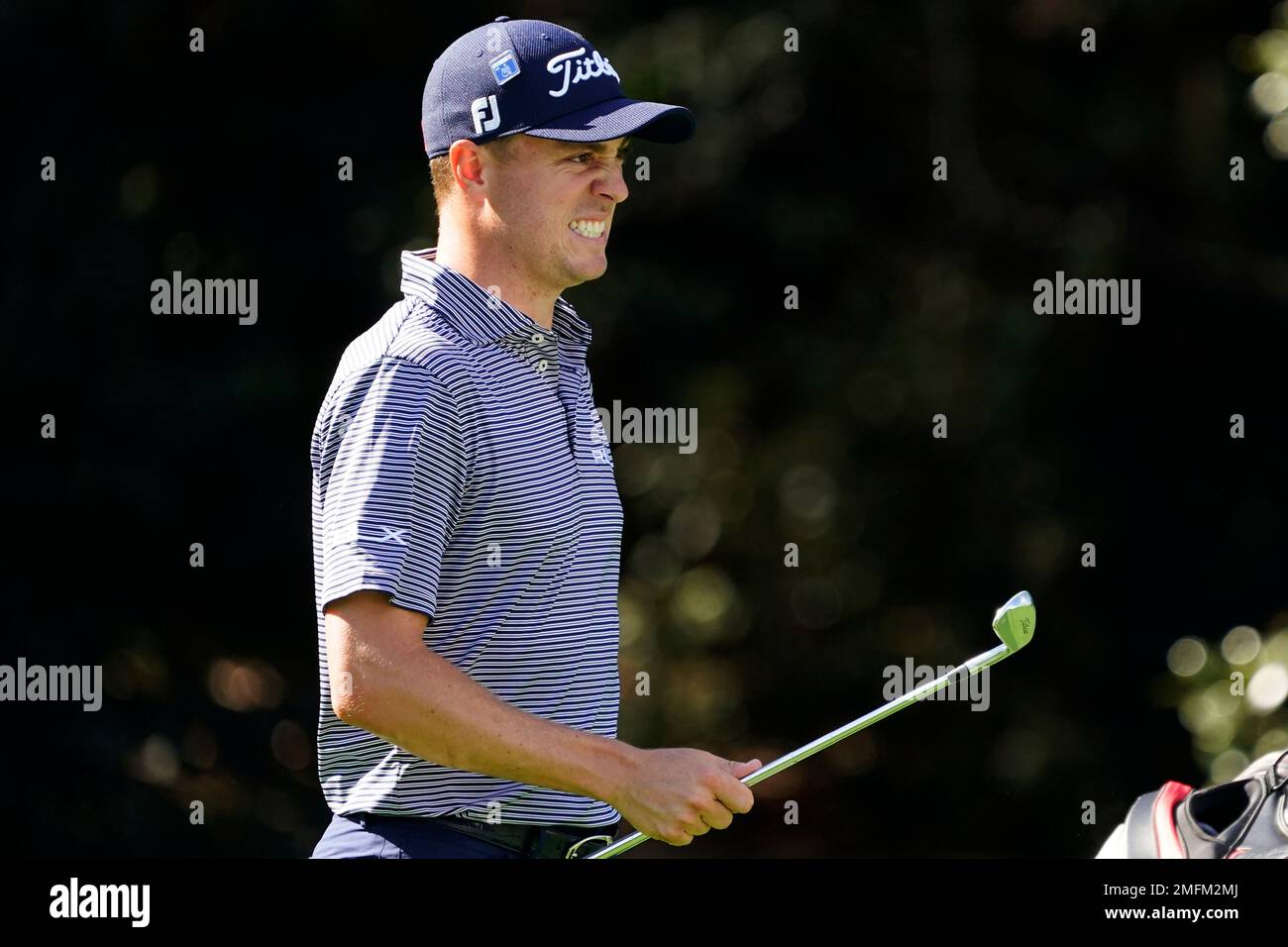 Justin Thomas reacts as his tee shot on the 16th hole during the second ...