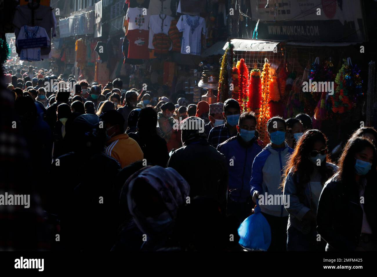 Shoppers crowd the Ason market during first day of Tihar festival in ...