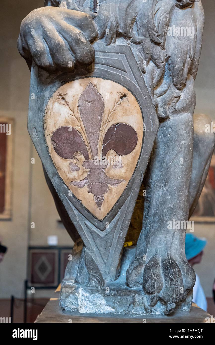 Detail of shield held by a lion in ancient sculpture in stone Stock ...