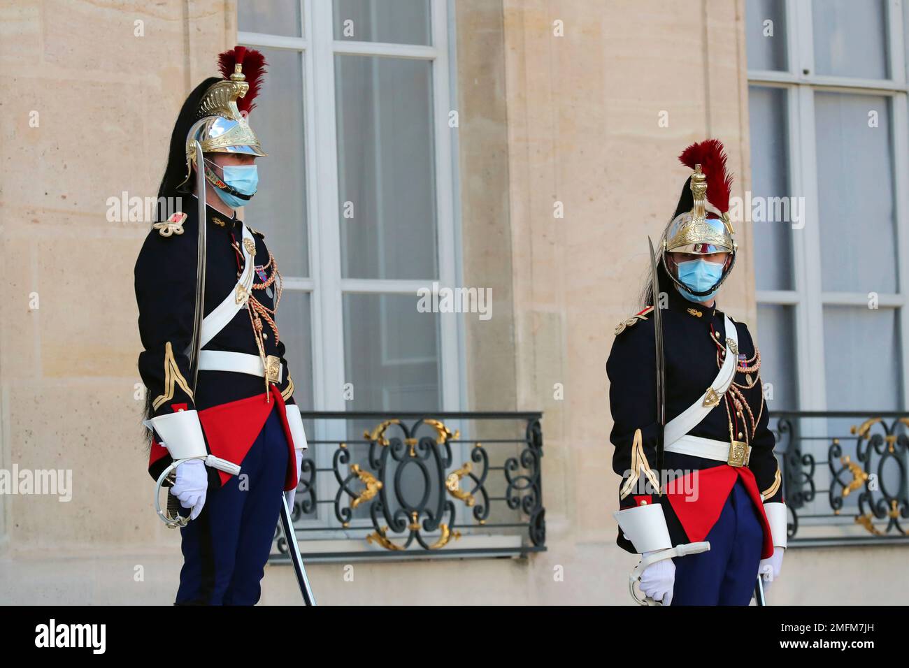 Republican guards wear face masks during the peace forum meeting, at ...