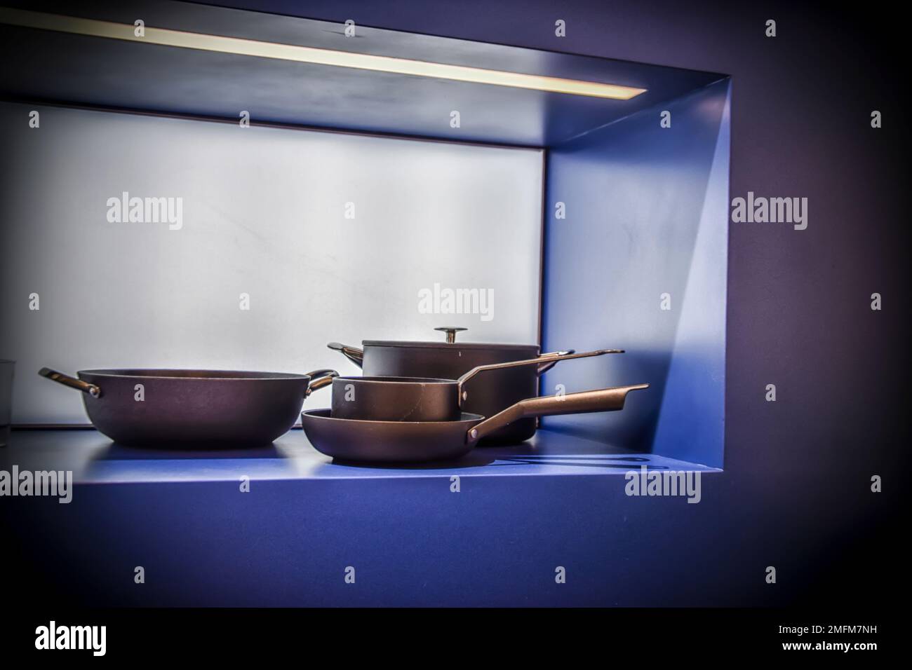 A minimalistic still life with pots and pans with blue background Stock ...